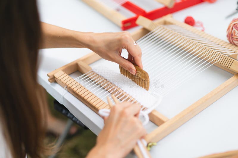 Girl Weaving Small Rug with Pattern at Masterclass on Weaving. Stock ...