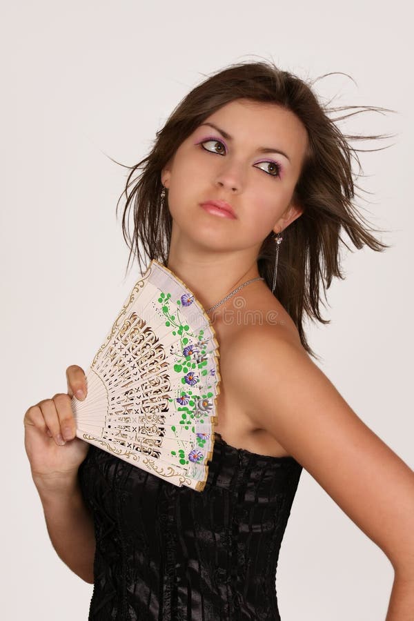 Girl with white fan stock image. Image of hair, holiday - 9928331