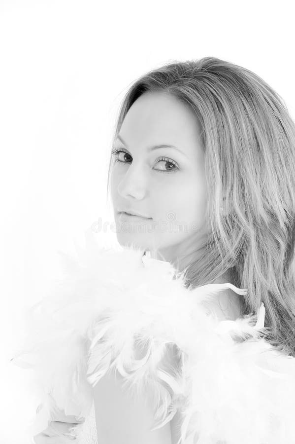 Girl with white feathers stock photo. Image of january - 6963810
