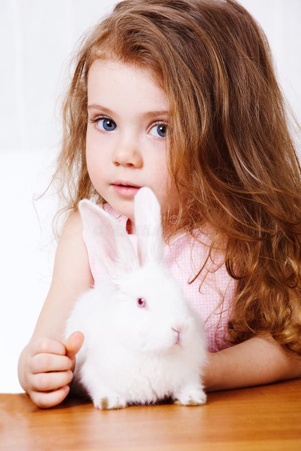 Child with Pet Rabbit stock photo. Image of young, rabbit - 2020250