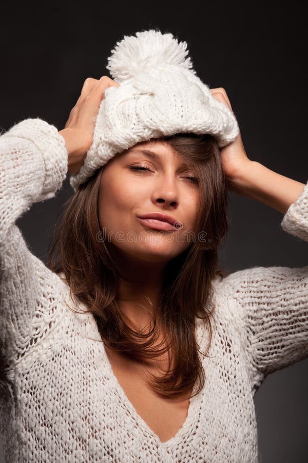 Girl in white wool and cap stock image. Image of dreaming - 22838829