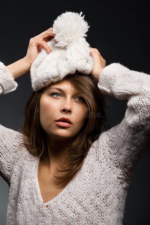 Girl in white wool and cap stock image. Image of daydreaming - 23783421