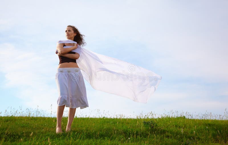 Girl on wind stock photo. Image of brown, blue, female - 10495824