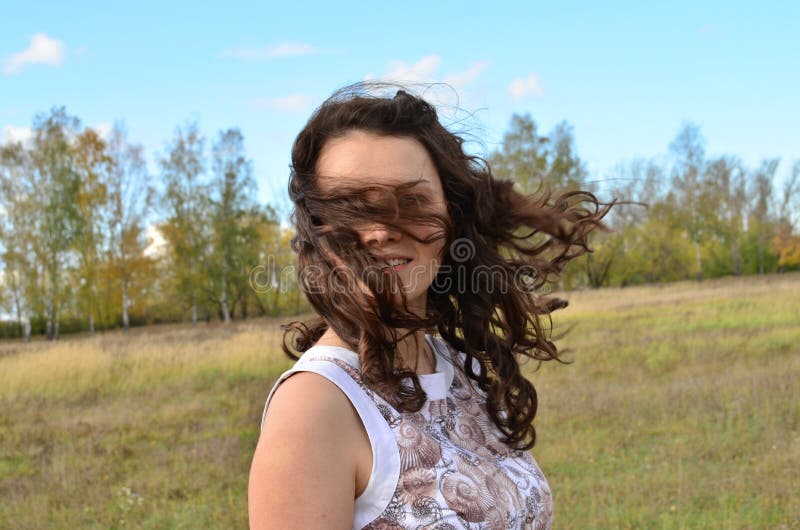 The girl in the wind stock image. Image of hare, dress - 28660537