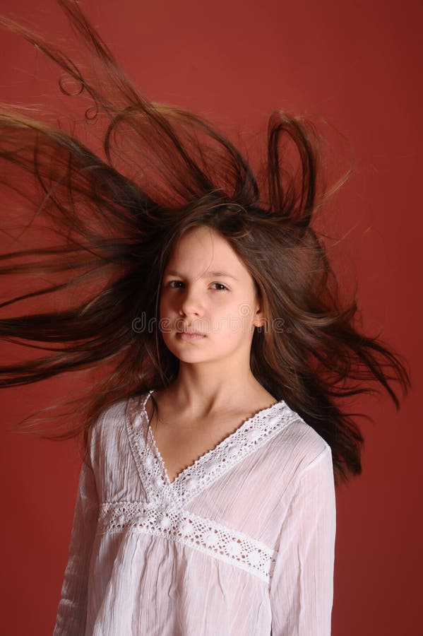 Girl in the Wind. Portrait Girl Whose Hair is Flying in the Wind Stock ...