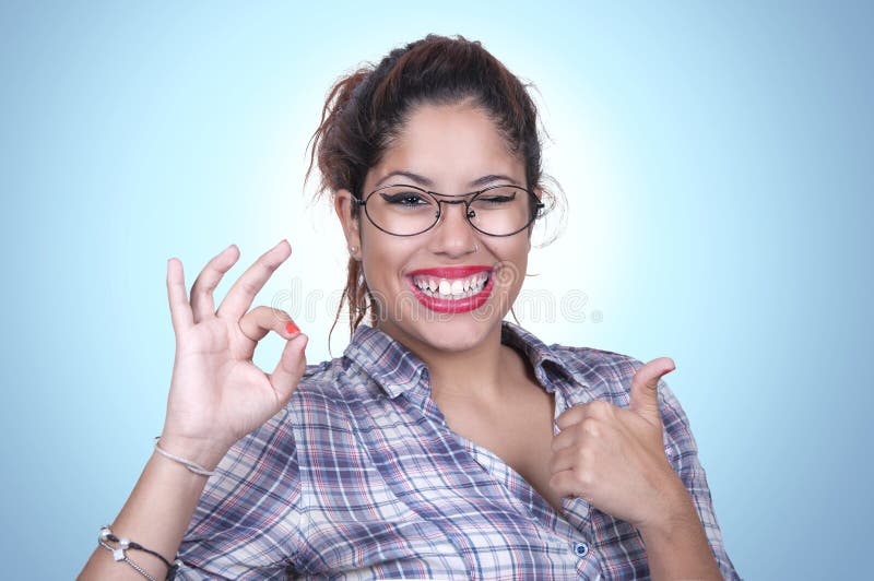 Girl Winking with Thumb Up and Ok Sign Stock Image - Image of good ...