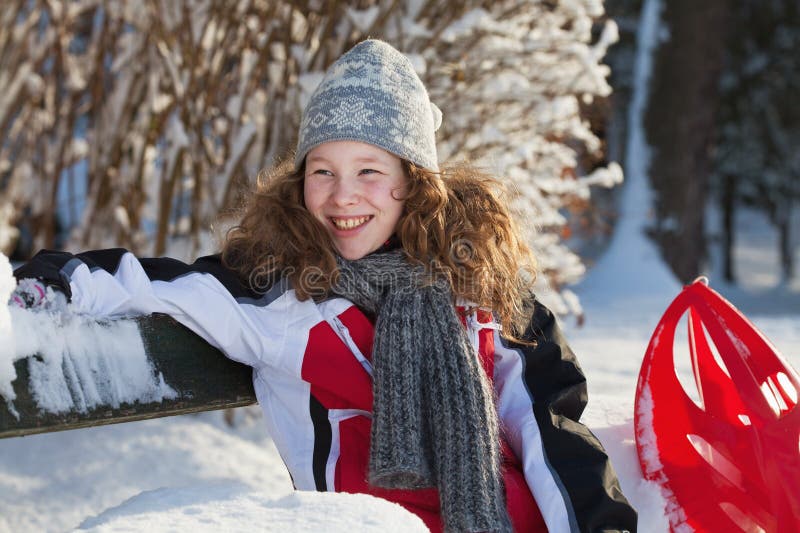 Girl in Winter Cloths with Red Sledge Stock Photo - Image of sitting ...
