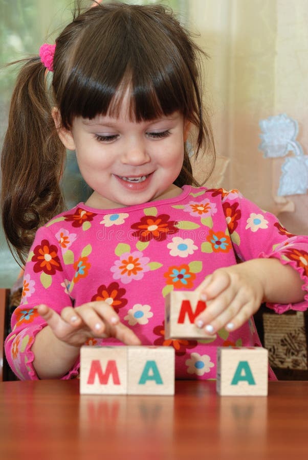 The Girl and Word Mama from Cubes Stock Photo - Image of happiness ...