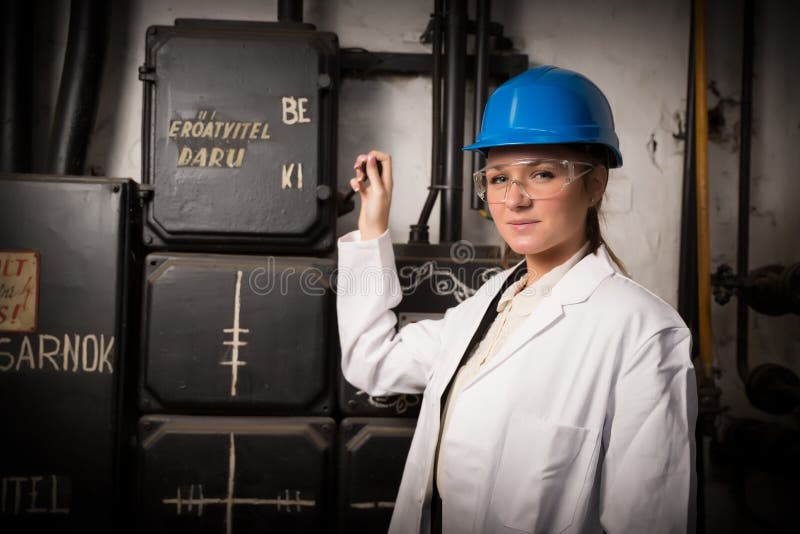 Girl worker in the factory stock photo. Image of security - 35122068