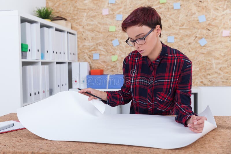 Girl Working with Blueprints Stock Image - Image of pencil, house: 76726001