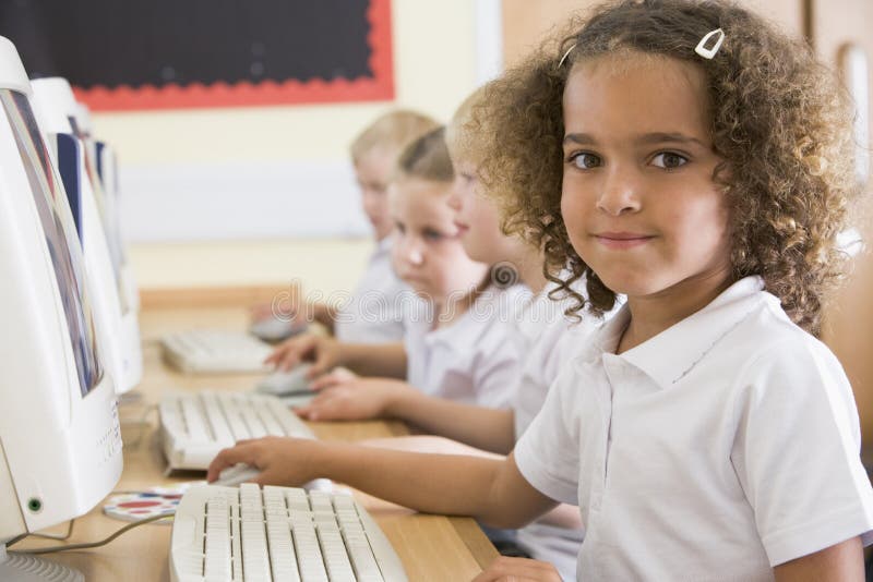 Girl Working on a Computer at Primary School Stock Image - Image of ...