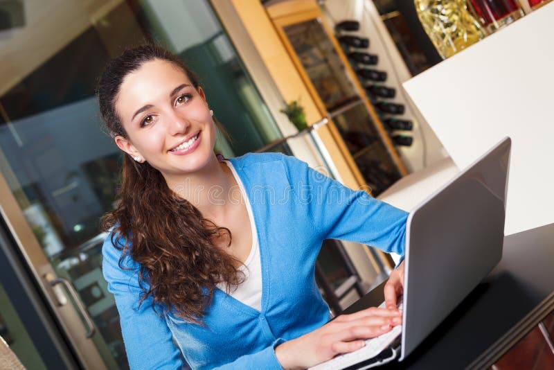 Girl working on a computer stock image. Image of coffeehouse - 60142373