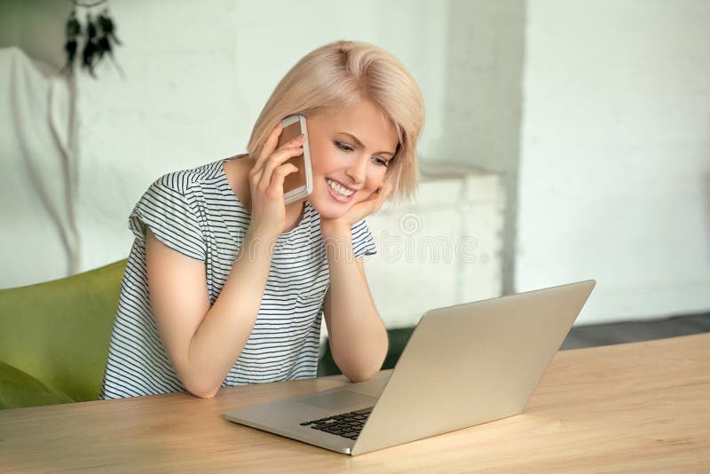 Girl Working on Computer and Talking Phone Stock Image - Image of home ...