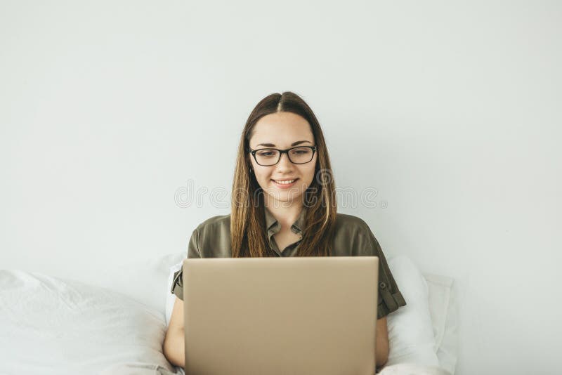 Girl working on laptop stock photo. Image of reading - 187228642