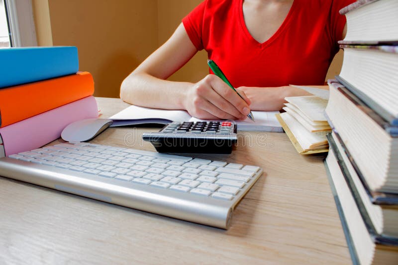 Girl is Working with Paper Sheet at the Wood Table Stock Image - Image ...