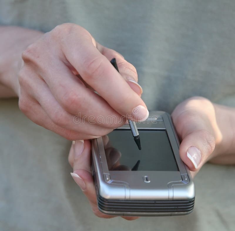 Girl Working on pda stock image. Image of human, personal - 5660423