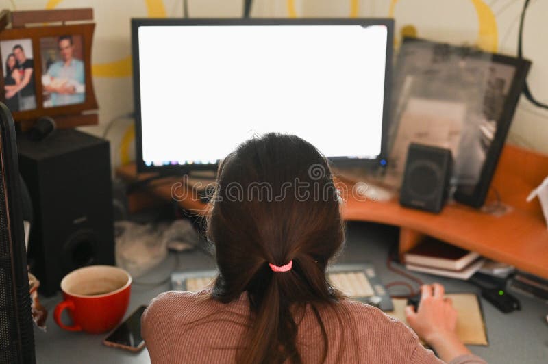 Girl Works Behind Computer Monitors. Background. Remote Work. Freelance ...