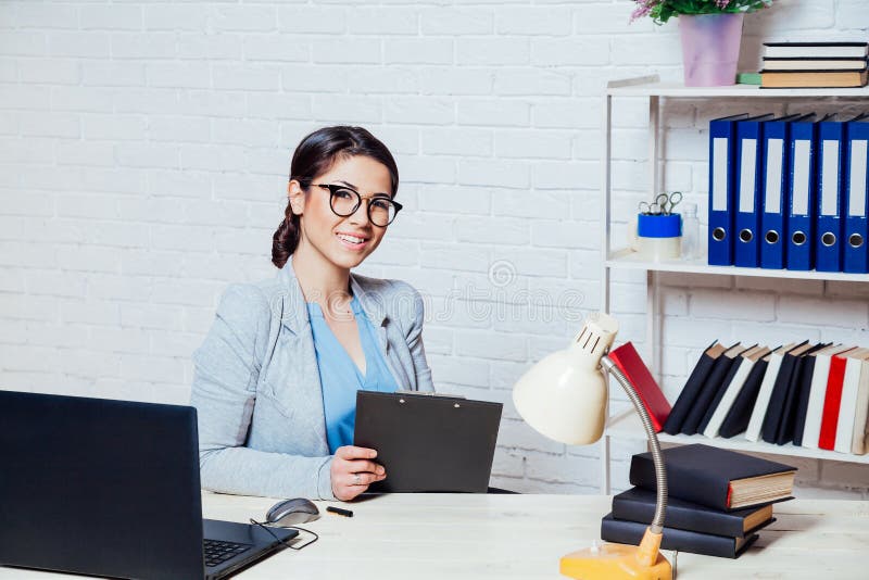The Girl Works in an Office at a Computer Stock Photo - Image of smile ...