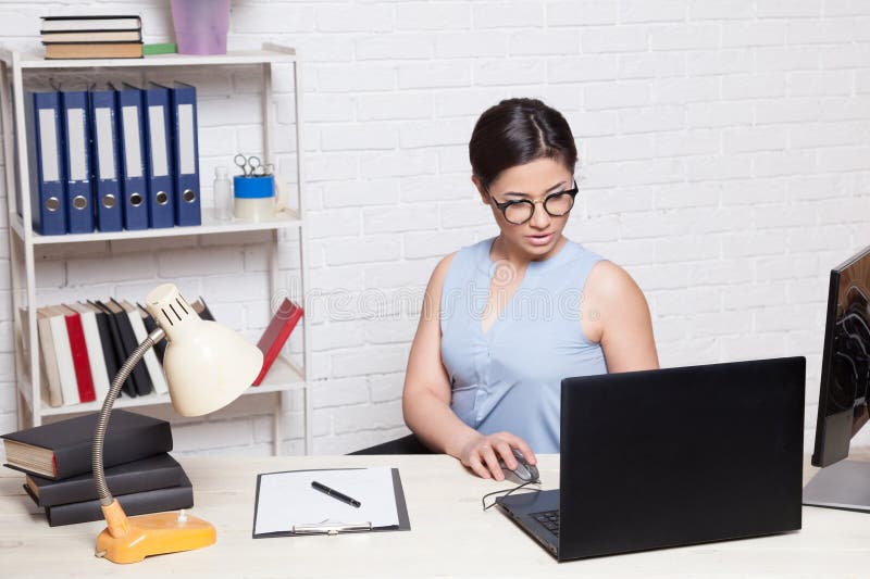 The Girl Works in an Office at a Computer Stock Image - Image of ...