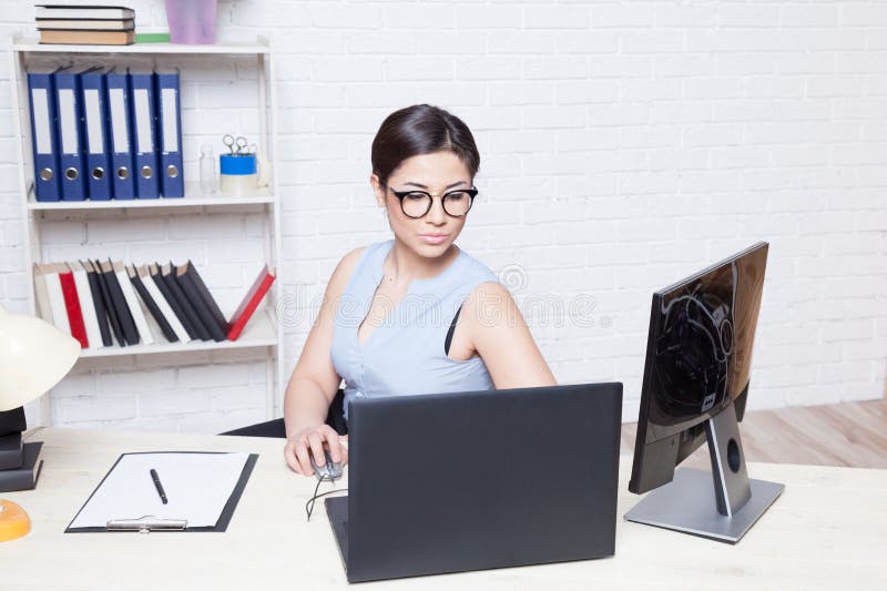 The Girl Works in an Office at a Computer Stock Photo - Image of ...