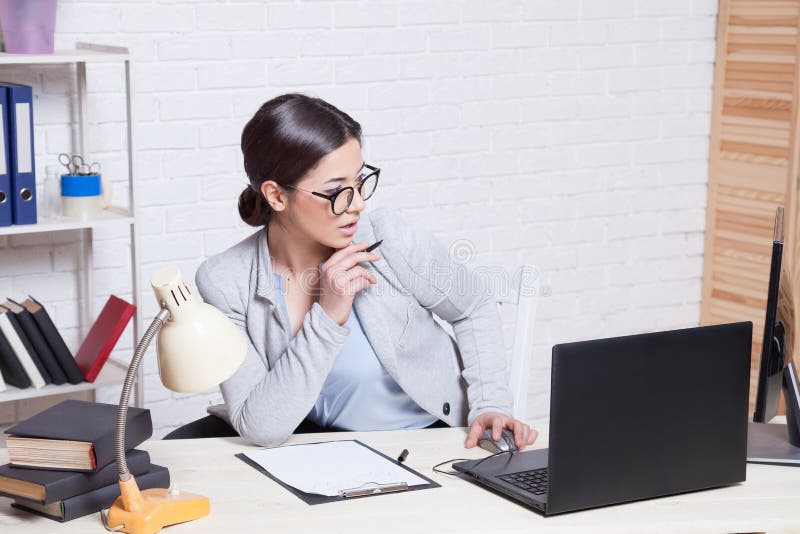 The Girl Works in an Office at a Computer Stock Image - Image of ...