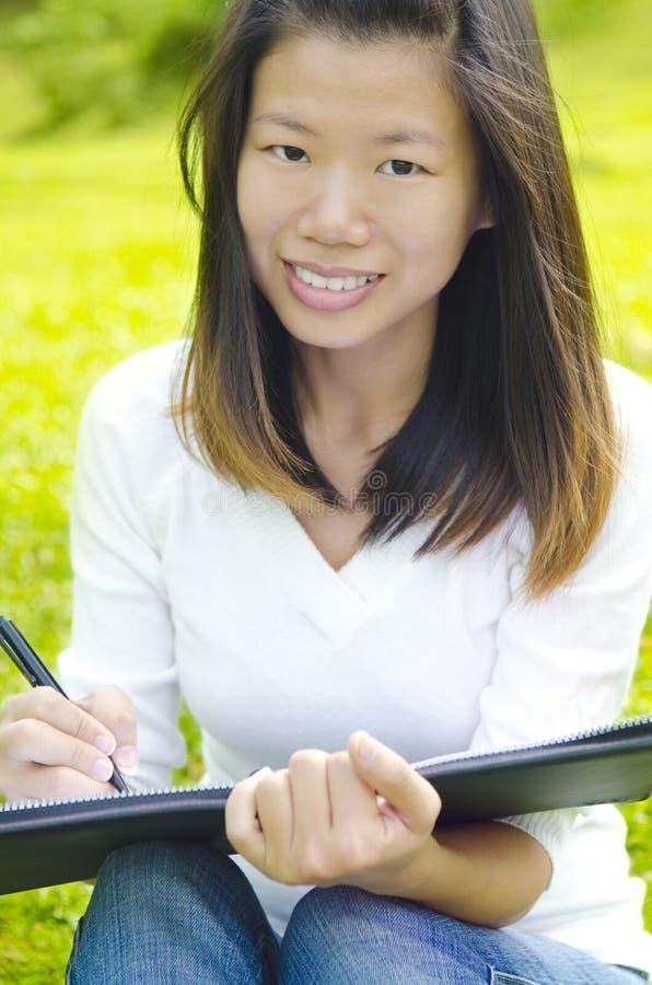 Girl writing stock image. Image of malaysian, homework - 18897563