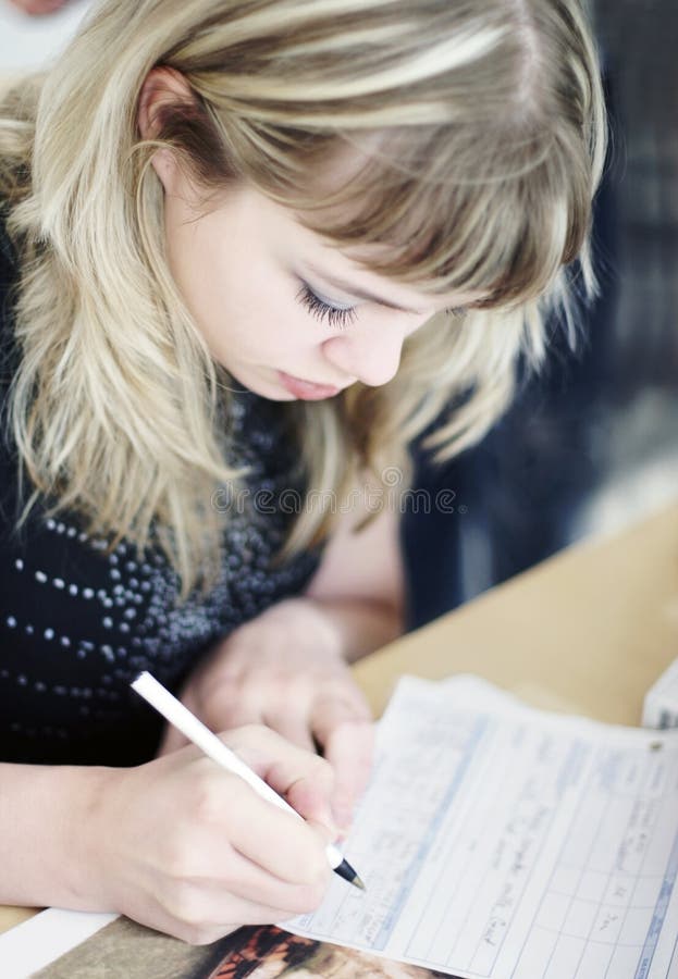 Girl writing stock photo. Image of papers, people, student - 231378