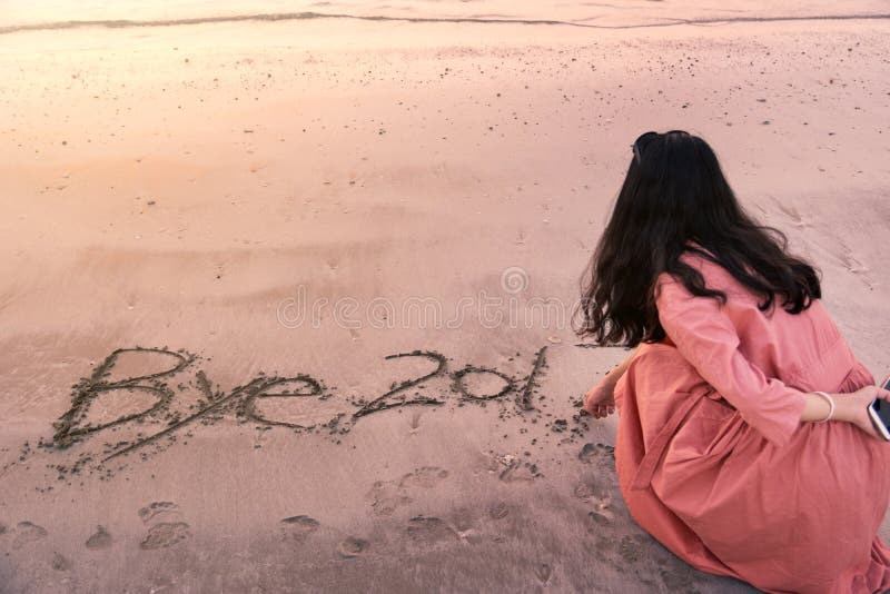 Girl Writing Bye 2017 Note in the Sand Stock Image - Image of card ...