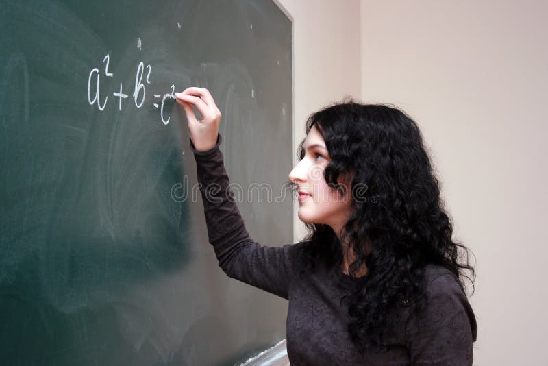 Girl writing formula stock photo. Image of chalkboard - 11955382