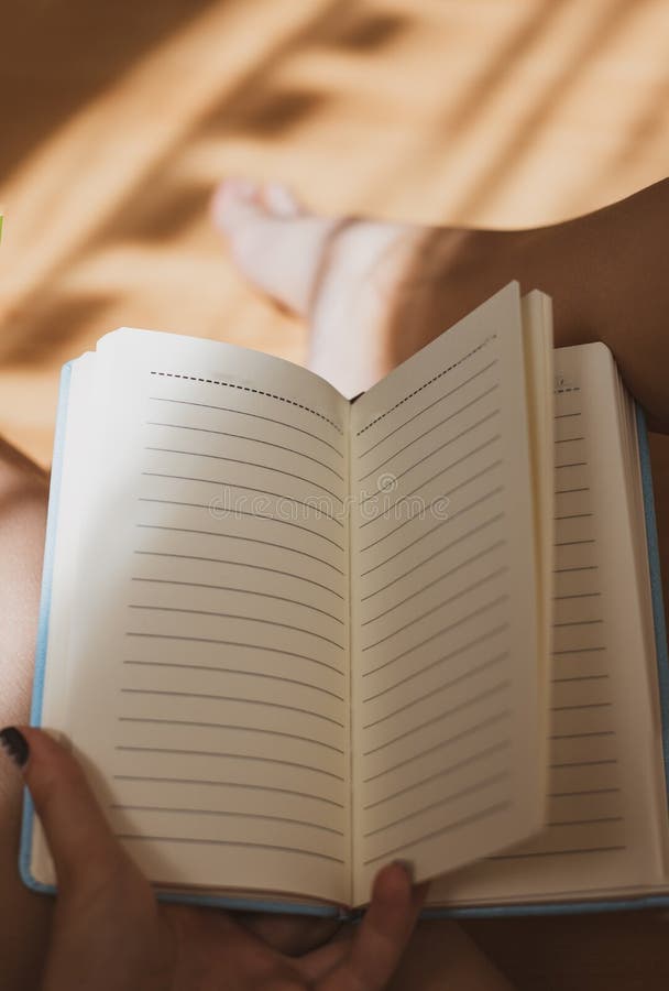A Girl Writing in Her Notebook. Empty Notebook Stock Image - Image of ...