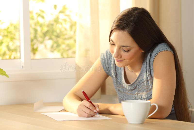 Girl Writing a Letter on a Table Stock Photo - Image of hand, filling ...