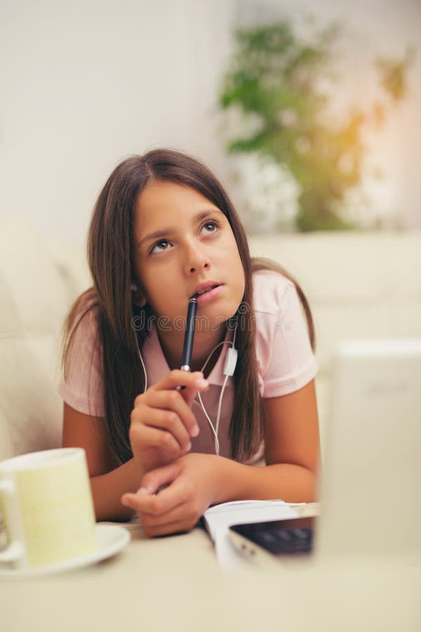Girl writing in a notebook stock photo. Image of notebook - 79360980