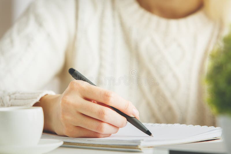 Girl writing in notepad stock image. Image of learning - 81473513