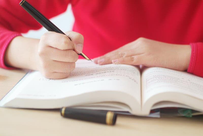 Girl writing for study stock photo. Image of face, happiness - 54493778