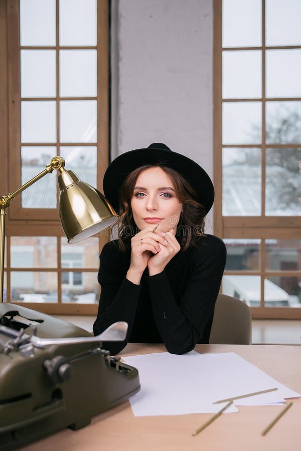 Girl at the writing table stock photo. Image of businesswoman - 176256126