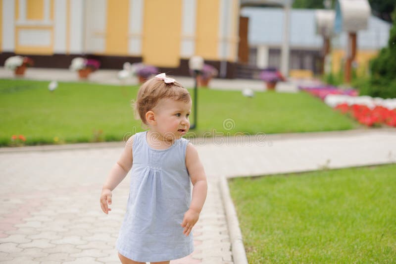 Girl in Yard stock image. Image of offspring, nature - 41203627