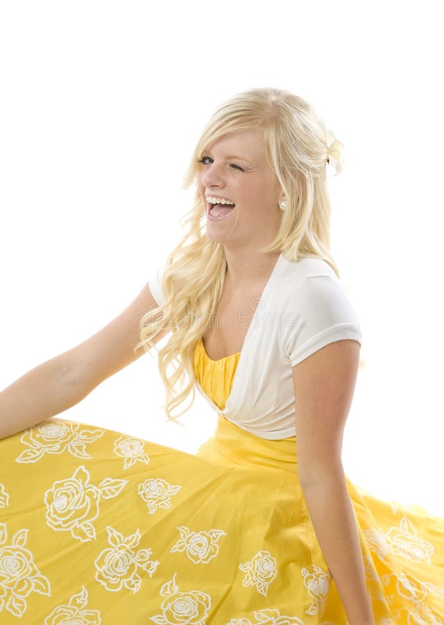 Girl in Yellow Sitting Leg Up Stock Image - Image of education, blonde ...