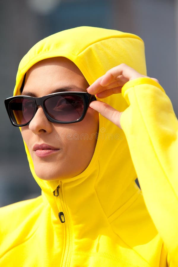 Girl in a yellow hood stock photo. Image of horizontal - 24080976