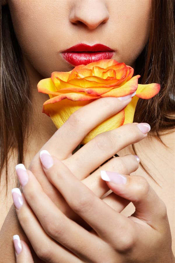 Girl with yellow rose stock photo. Image of beauty, hand - 15195296