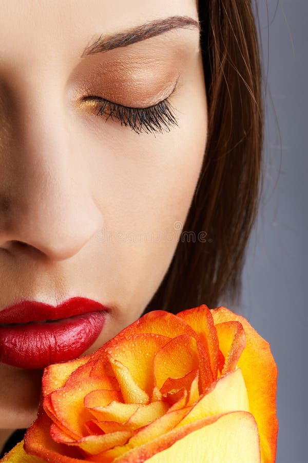 Girl with yellow rose stock image. Image of studio, people - 16033791