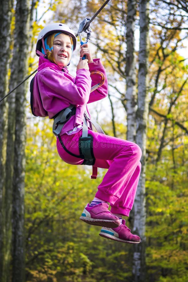Girl on Zip Line stock image. Image of amusement, park - 109397529