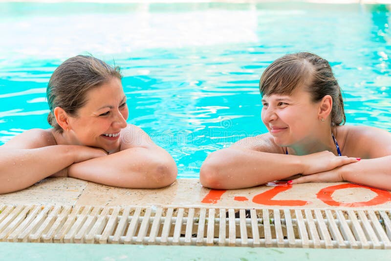 Girlfriend at the Edge of the Pool Stock Image - Image of hair, person ...