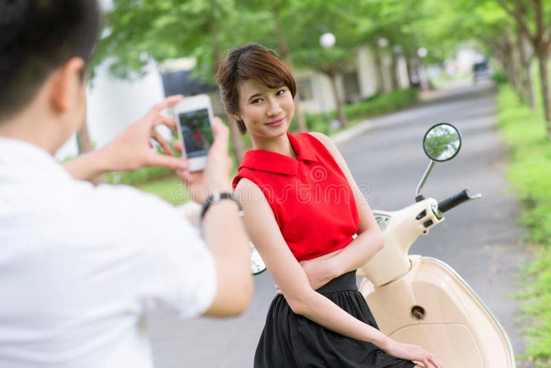 Girlfriend photo shoot stock image. Image of mobile, outdoors - 28183995