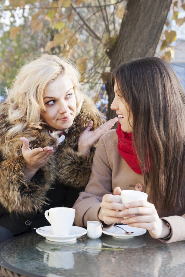 Girlfriends Gossip and Coffee Stock Photo - Image of chatting, happy ...