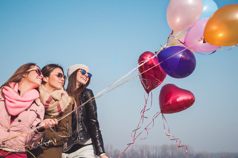 Girlfriends Having Fun with Balloons Stock Image - Image of female ...