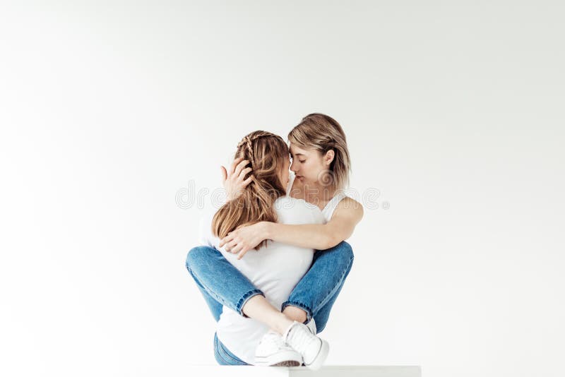 Girlfriends Hugging Each Other Stock Photo - Image of together ...