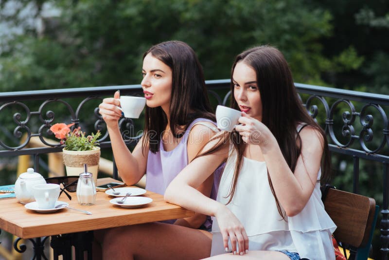 Girlfriends are Sitting in Coffee and Drinking Tea Stock Photo - Image ...