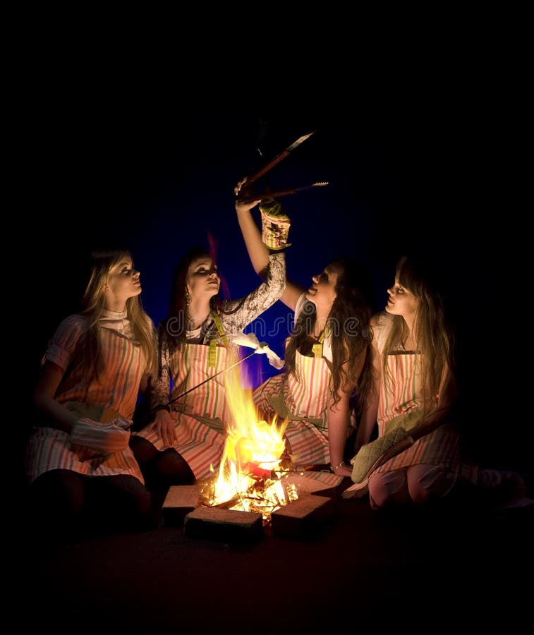 Girls in Ukrainian National Shirts Dancing Around a Campfire. Midsumer ...