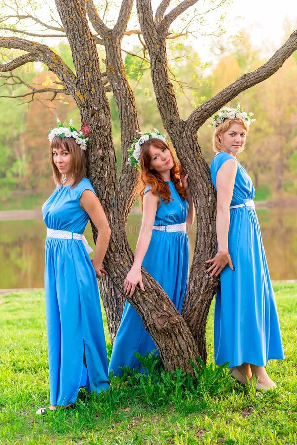 Girls Around a Tree Near the Lake Stock Photo - Image of freshness ...