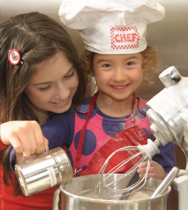 Girls Baking stock photo. Image of youth, bake, help - 18164234